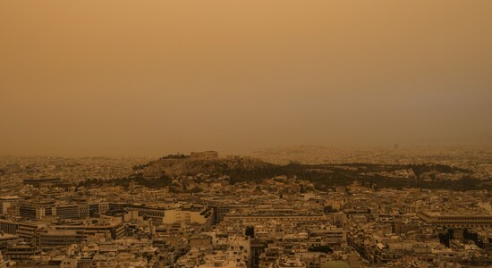 Stunning pictures of Greece turning orange from a Sahara sandstorm ...