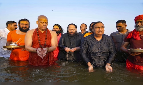 Reliance Industries Chief Mukesh Ambani and family take holy dip at ...