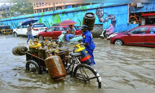 Mumbai rains: IMD issues orange alert, Tulsi Lake overflows after heavy ...