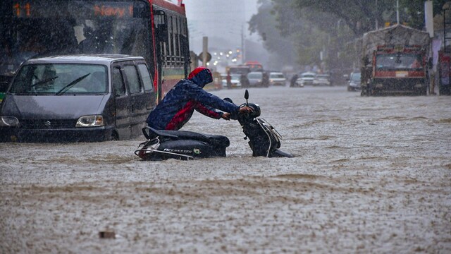 Watch | Streets flooded, trains delayed and schools shut as Mumbai ...