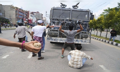 Indian tourist bus attacked amid Nepal unrest; several injured - CNBC TV18