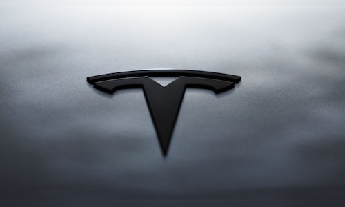 Tesla reports first annual sales drop on record but beats Q4 ...