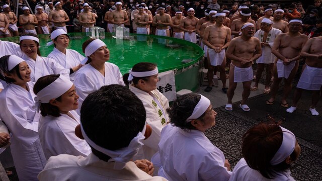 Inside Tokyo’s ice-cold new year purification ritual at Teppozu Inari ...