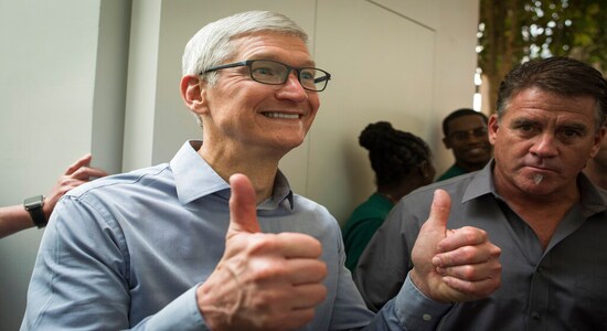 At Apple's new store opening, CEO Tim Cook poses for selfies with ...