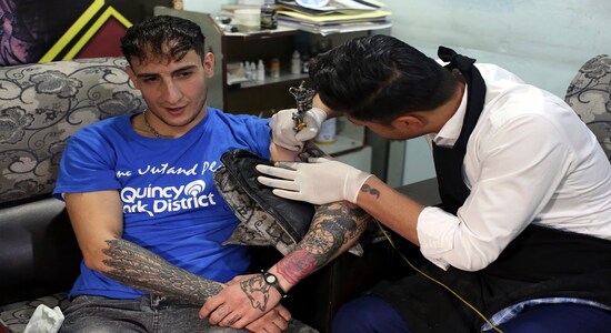 In Pictures: A tattoo at a time, Afghans take on society’s taboos