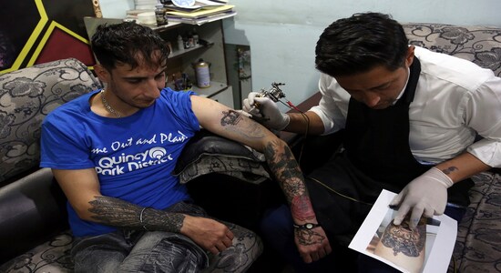 In Pictures: A Tattoo At A Time, Afghans Take On Society’S Taboos