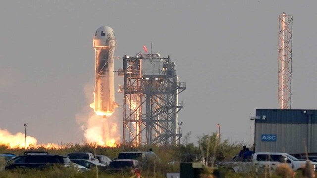 In pics: A look at Jeff Bezos' 1st passenger flight to space aboard ...