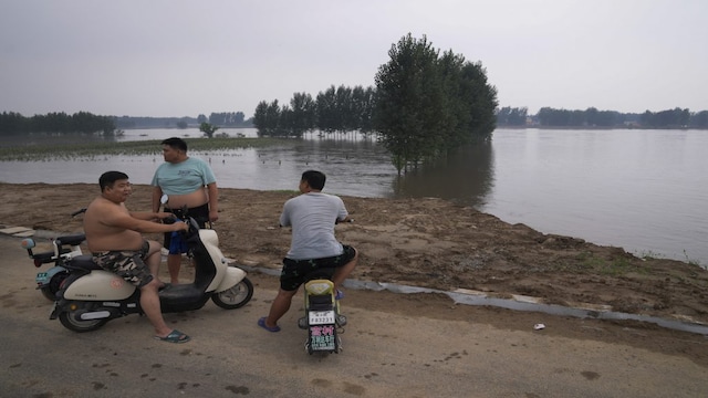 Beijing submerged in heaviest rainfall since 1883 - CNBC TV18