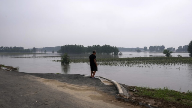 Beijing submerged in heaviest rainfall since 1883 - CNBC TV18