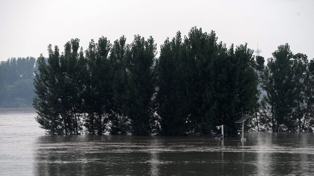 Beijing submerged in heaviest rainfall since 1883 - CNBC TV18