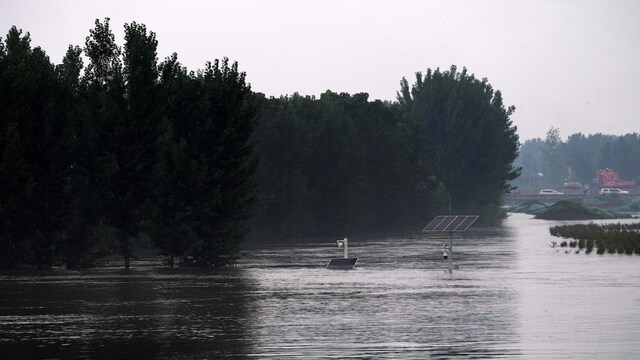 Beijing submerged in heaviest rainfall since 1883 - CNBC TV18