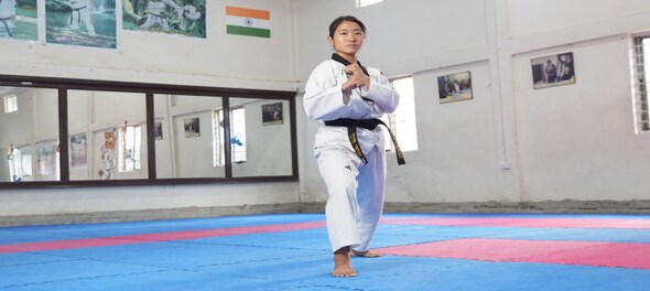 With her coach in South Korea, Taekwondo star Rupa Bayor is getting ...