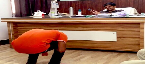 Man seen squatting at Bareilly SDM's office as punishment, official removed - CNBC TV18